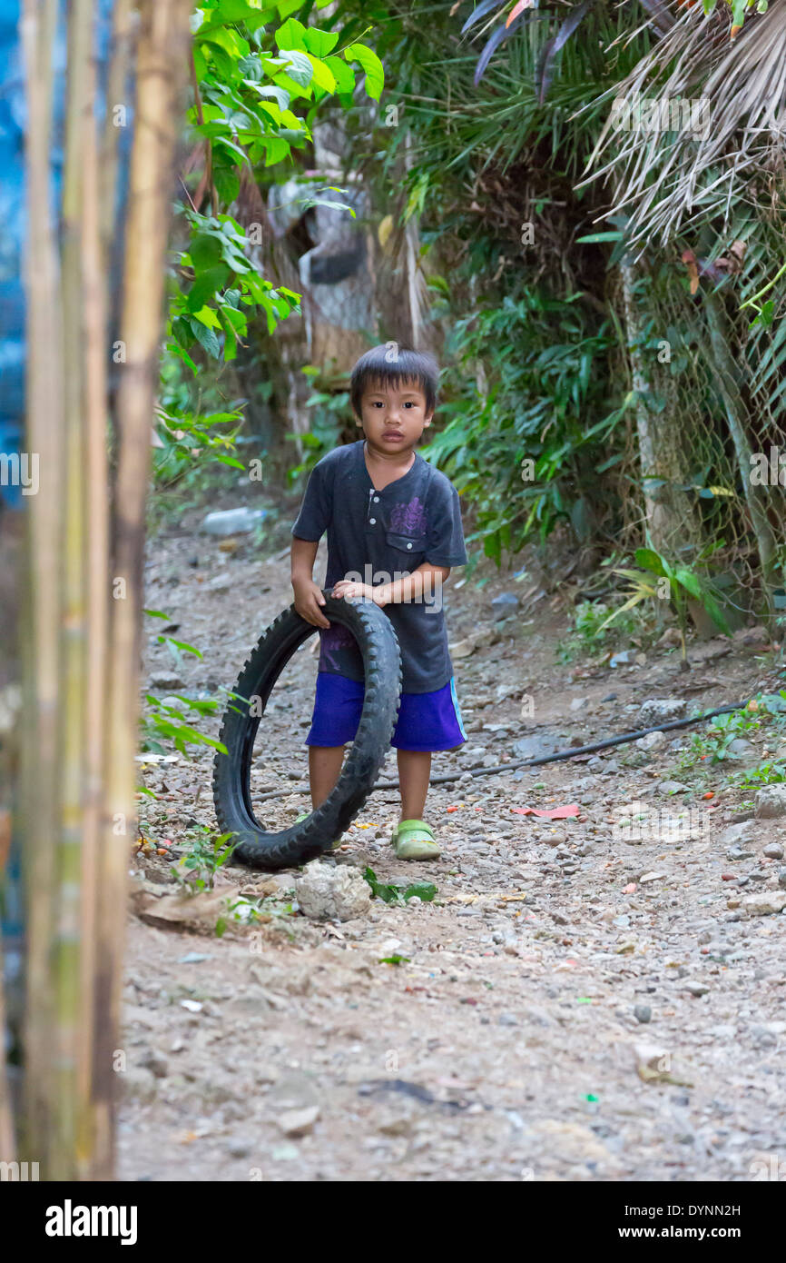 Little Boy playing in the Street in Puerto Princesa, Palawan ...