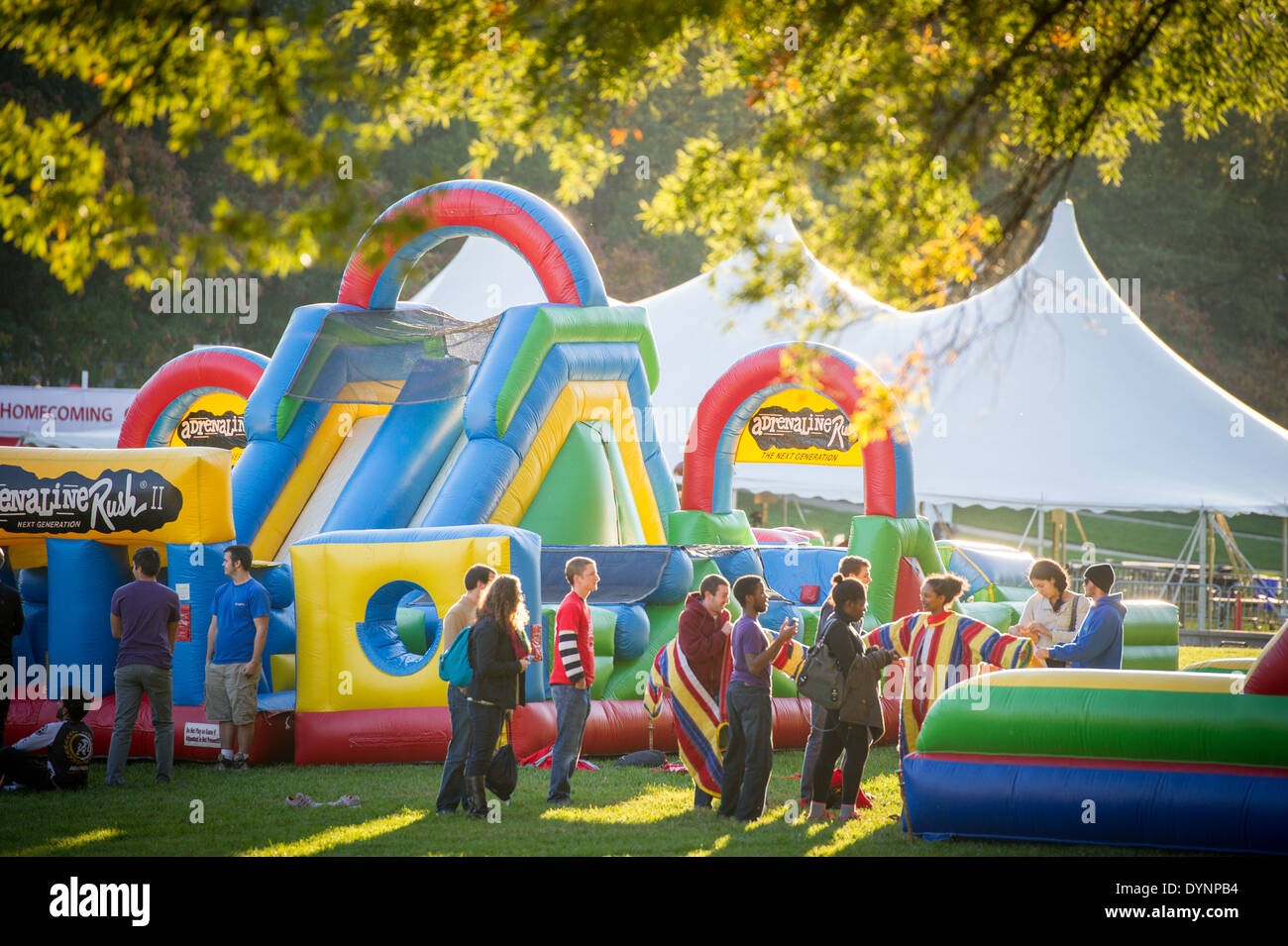 College students having fun at a homecoming party and pep rally in ...