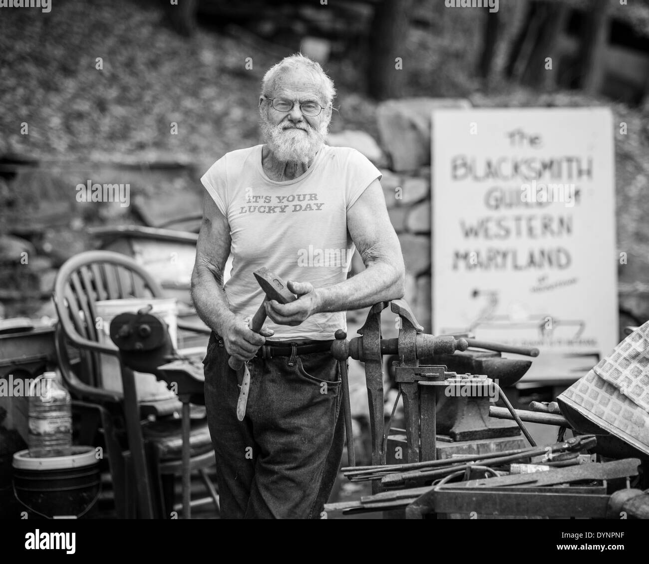 Blacksmith outside surrounded by tools Boonsboro MD Stock Photo - Alamy