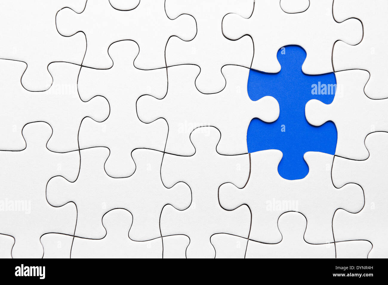 Blue puzzle piece missing on white background Stock Photo - Alamy