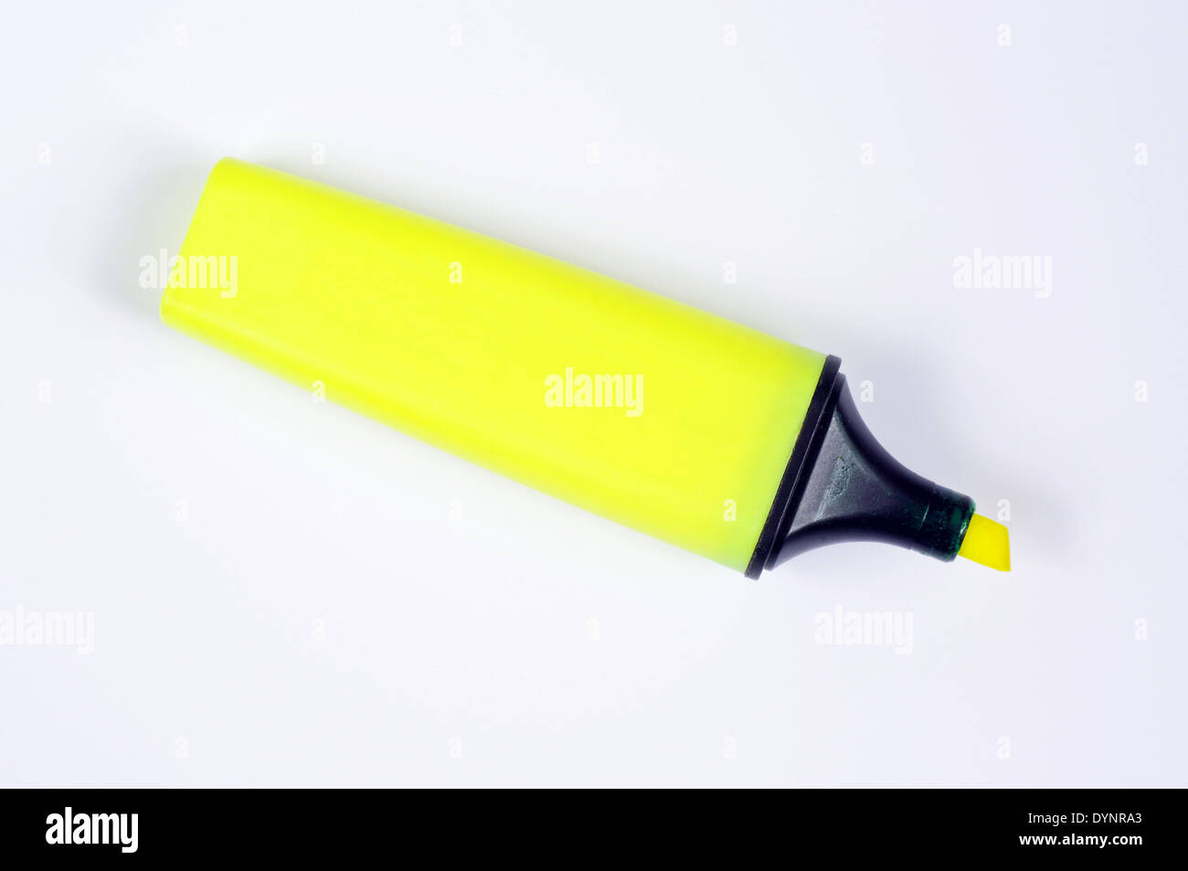 Yellow highlighter pen with cap removed against a white background ...