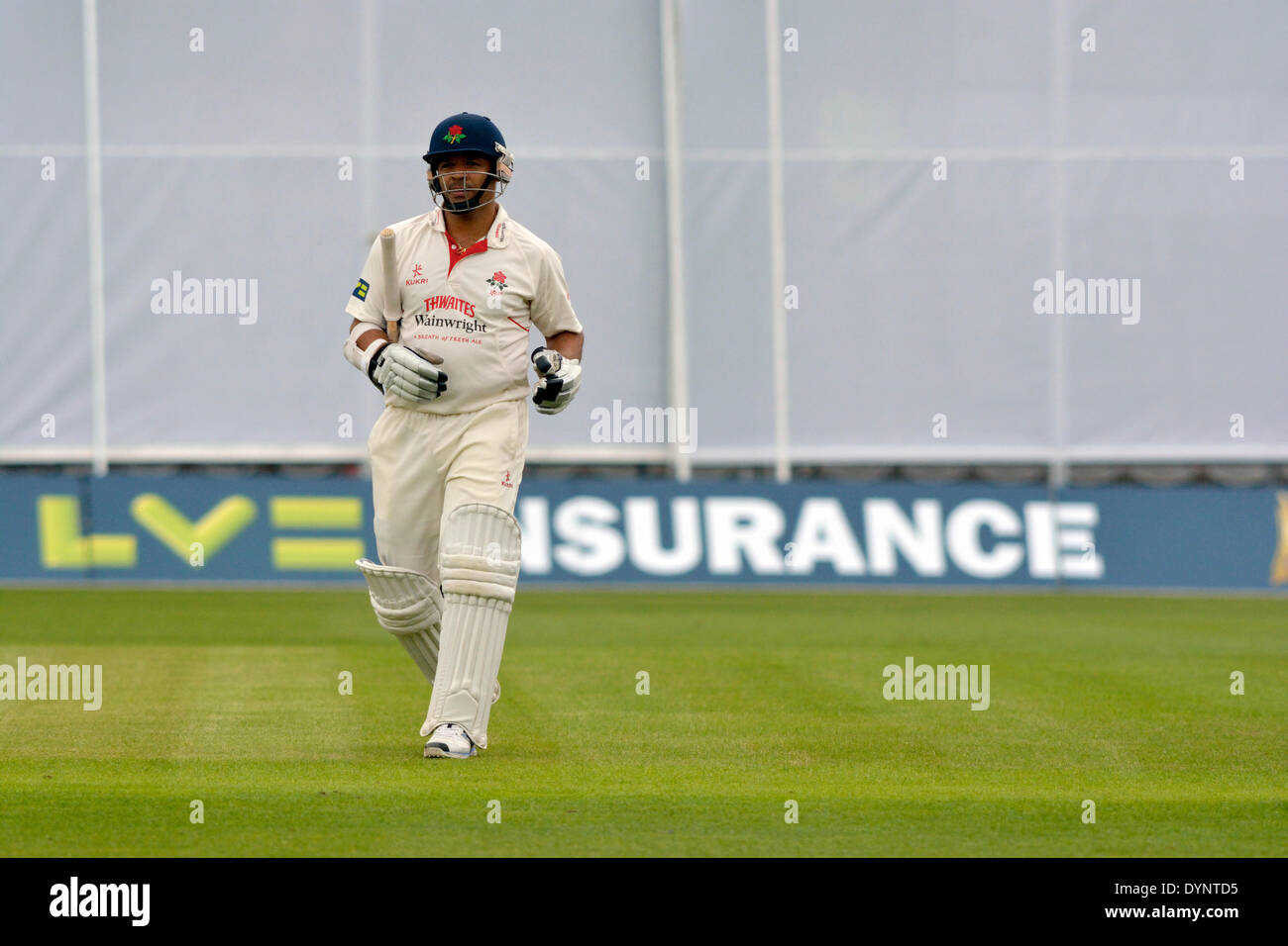 Manchester, UK. 23rd Apr, 2014. A disconsolate Ashwell Prince ...