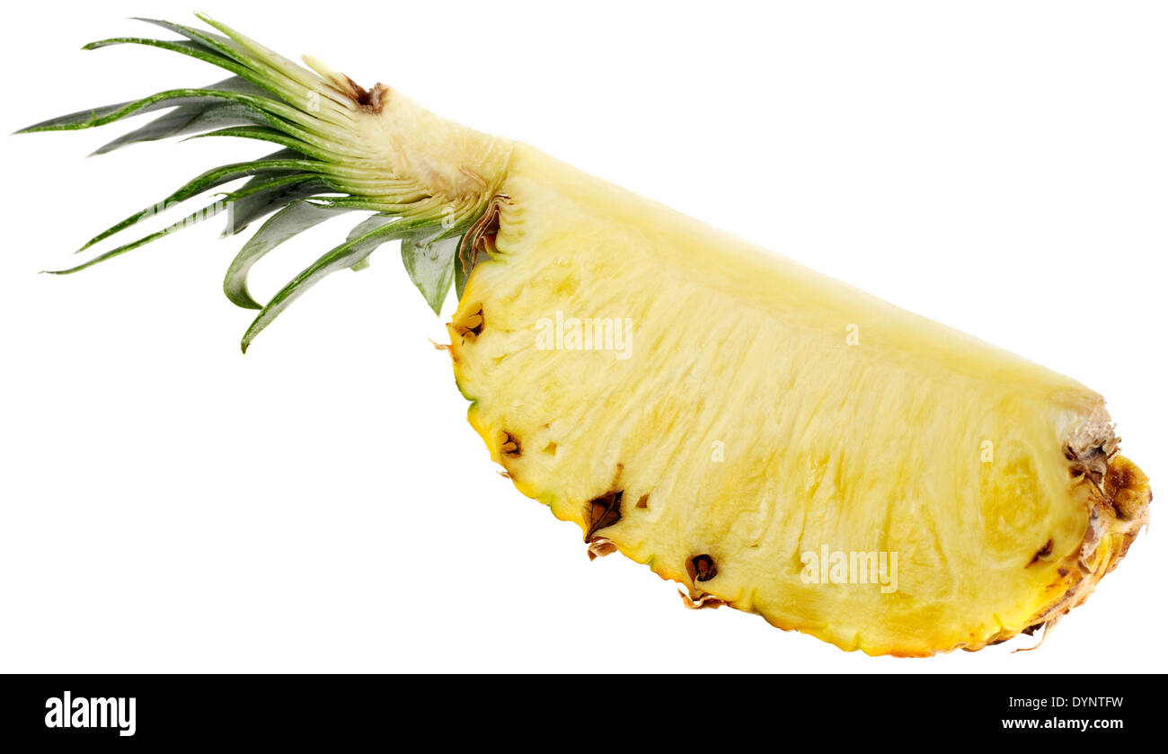 A PINEAPPLE CUT INTO A LEGNTH WAYS QUARTER ON A WHITE BACKGROUND Stock ...