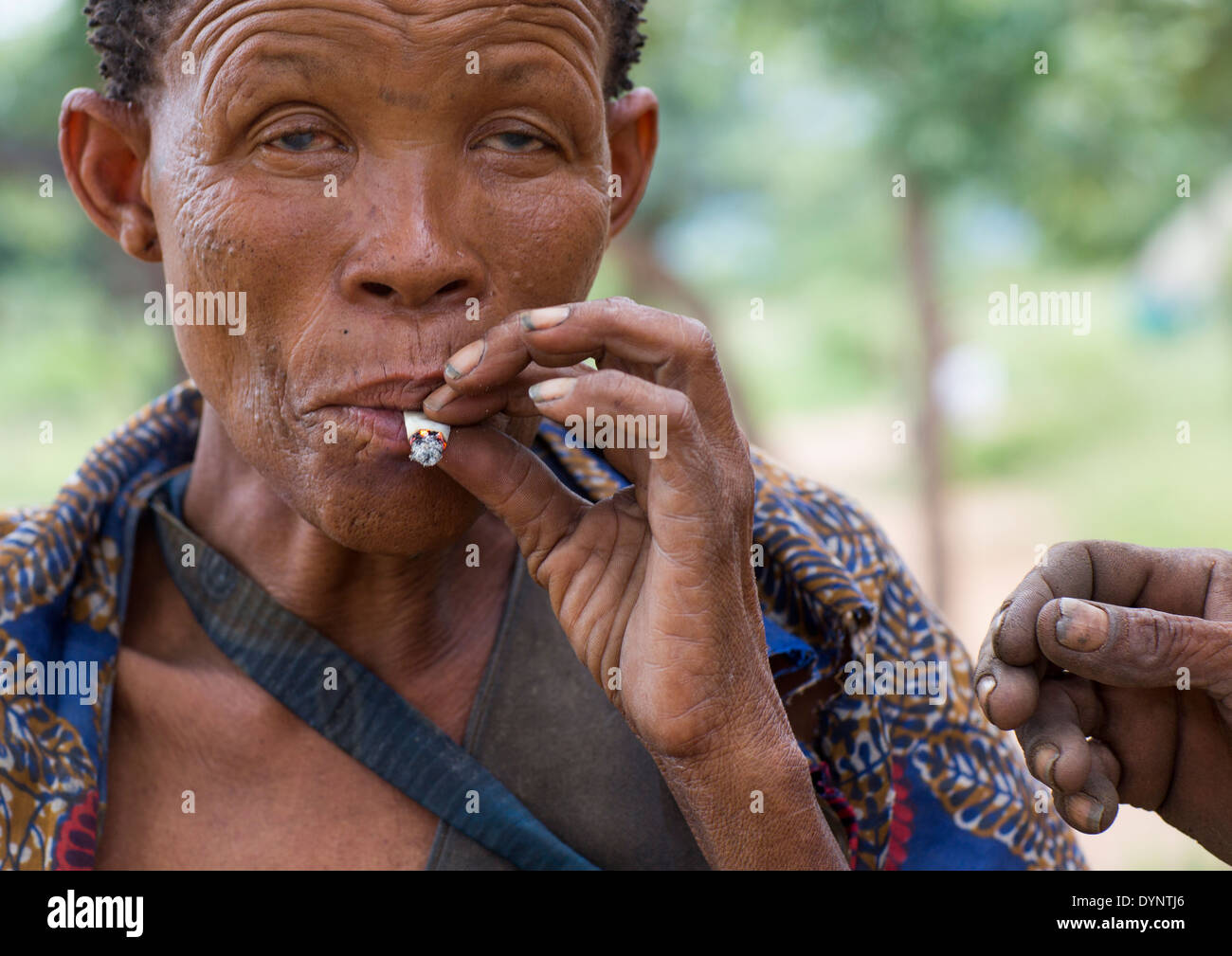 Bushman Woman Smoking, Tsumkwe, Namibia Stock Photo - Alamy