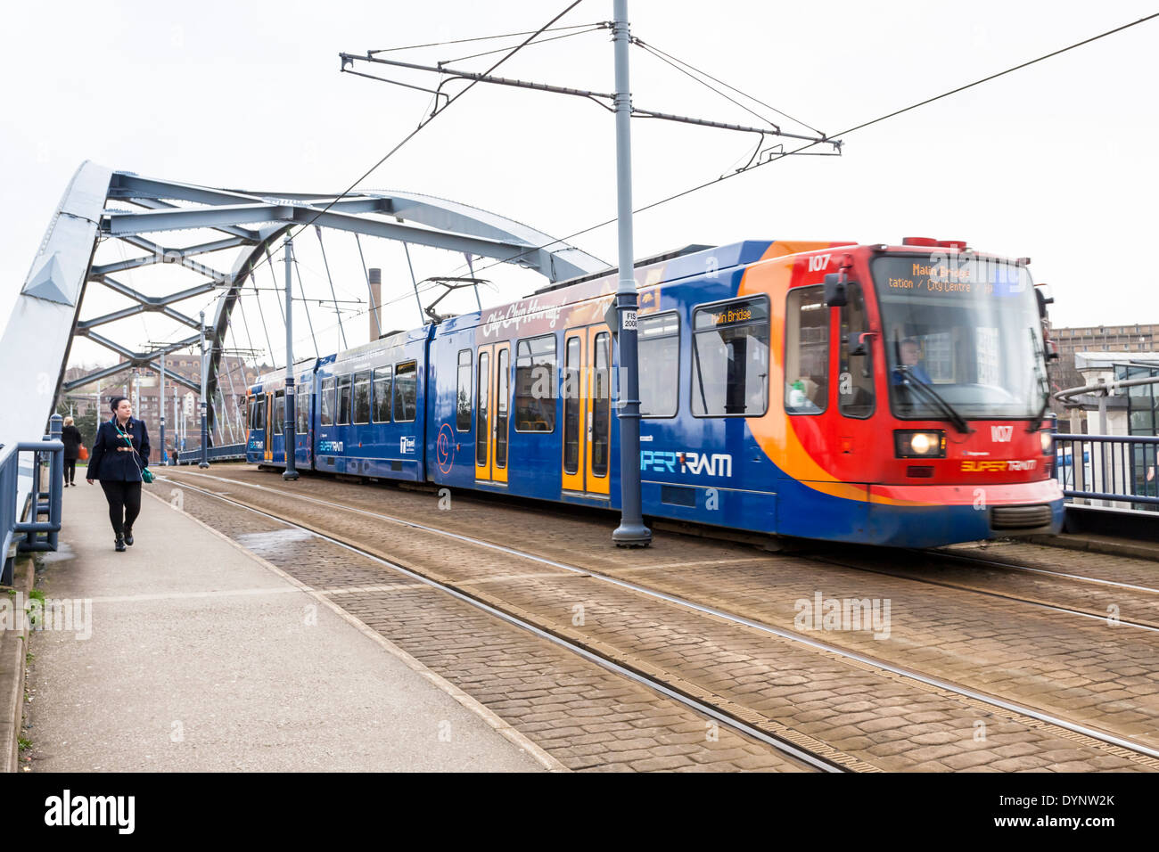 A Sheffield tram, known as Supertram, crossing the bridge at Park Square, Sheffield, England, UK ...