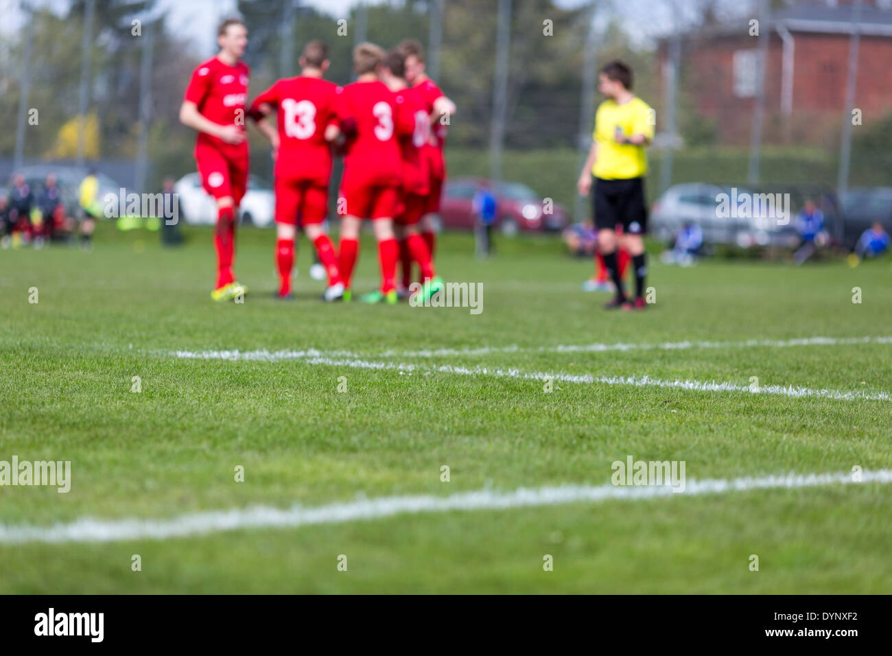 Soccer referee giving directions to a team defending their goal Stock ...
