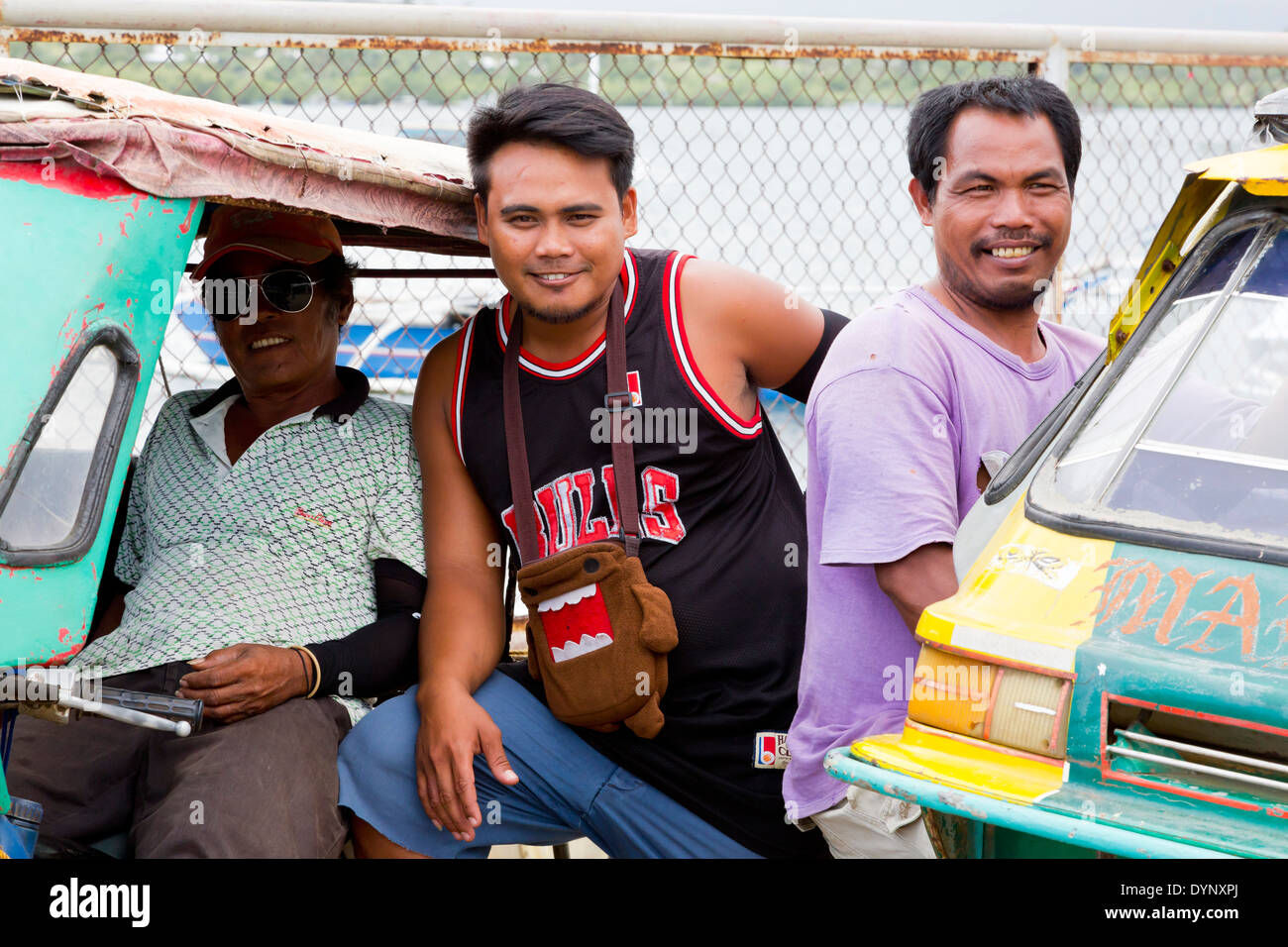 Tricycle Drivers in Puerto Princesa, Palawan, Philippines Stock Photo ...