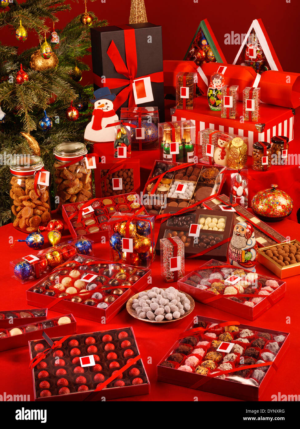 A FESTIVE COLLECTION OF MATCHING BOXED CHOCOLATES AND HAMPER GOODIES ...