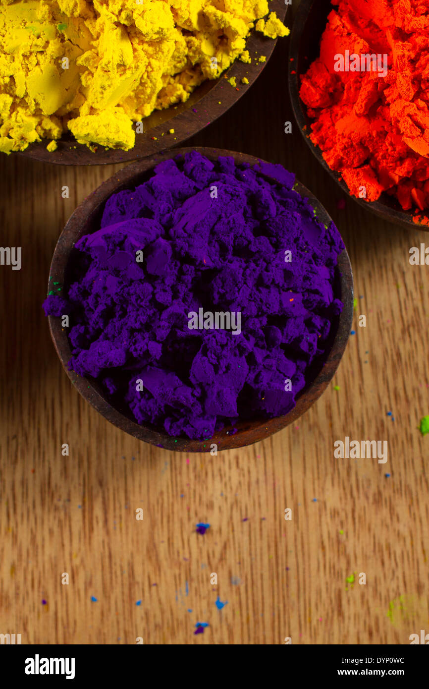 Colorful, finely powdered Indian pigments. Focus on purple powder, copy ...