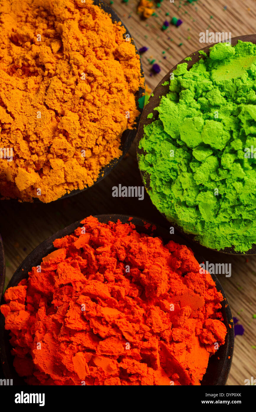 Colorful, finely powdered Indian pigments. Closeup on orange Stock ...