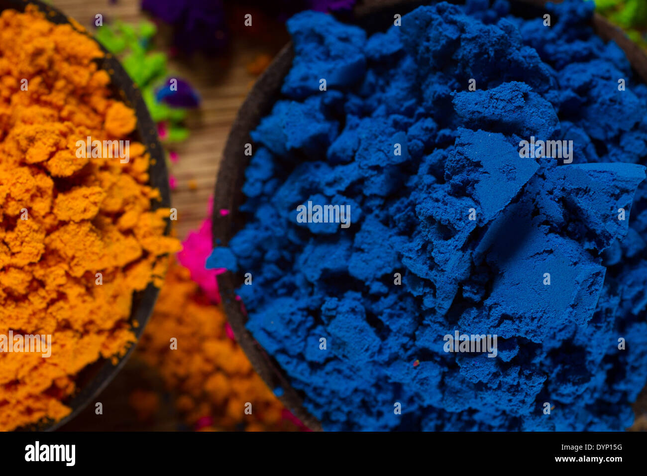 Colorful, finely powdered Indian pigments. Complementary colours: blue ...