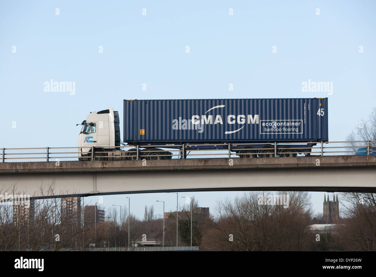 Containerised goods being transported on the road in an eco friendly ...