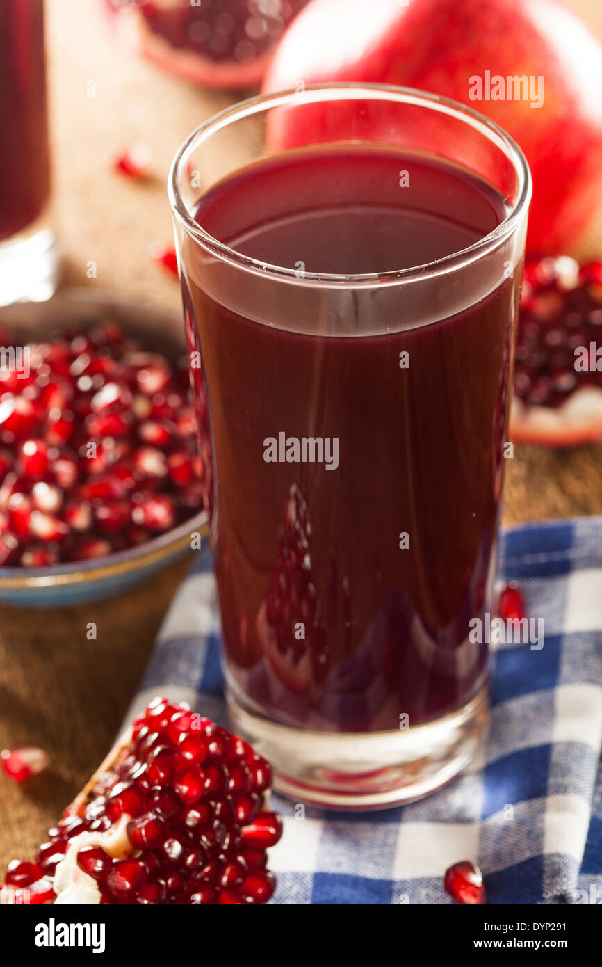 Healthy Organic Pomegranate Juice in a Glass Stock Photo - Alamy