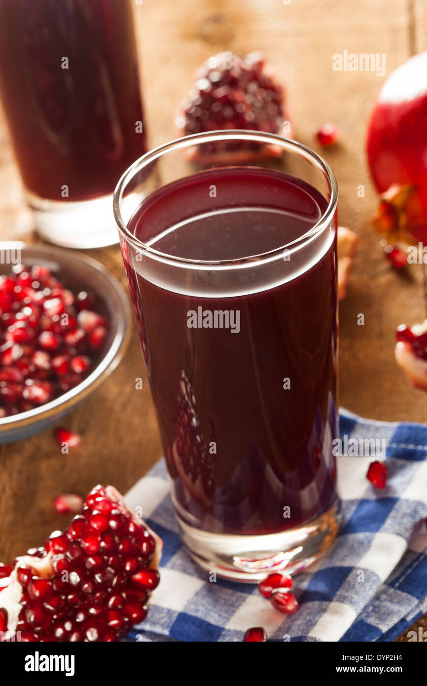 Healthy Organic Pomegranate Juice in a Glass Stock Photo - Alamy