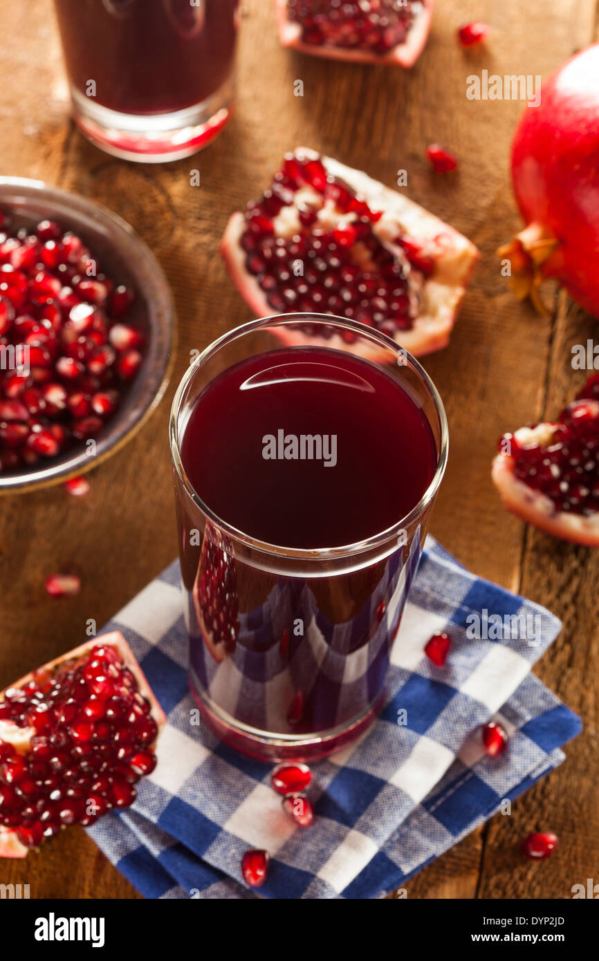 Healthy Organic Pomegranate Juice in a Glass Stock Photo - Alamy