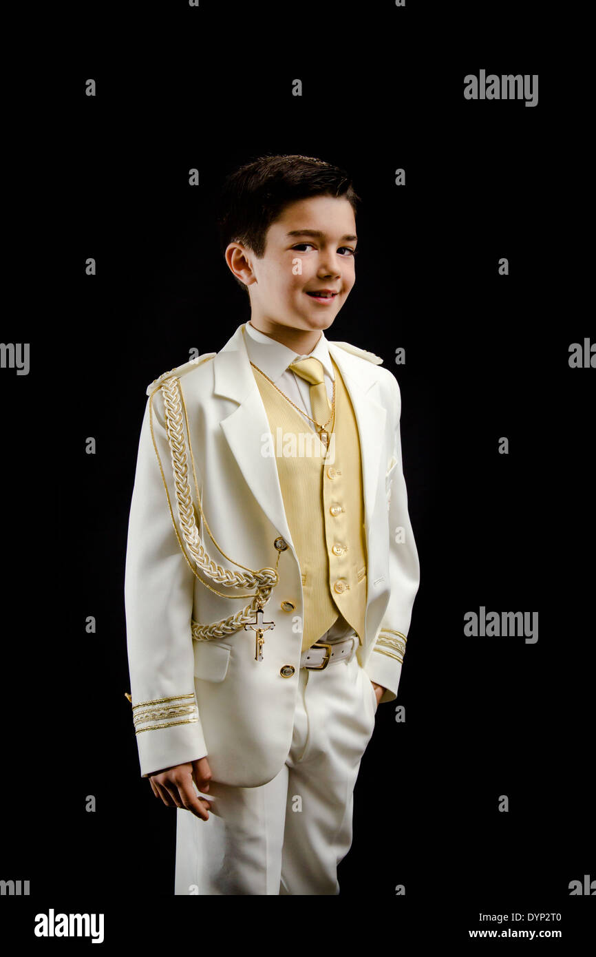 A young boy celebrating his First Holy Communion Stock Photo - Alamy