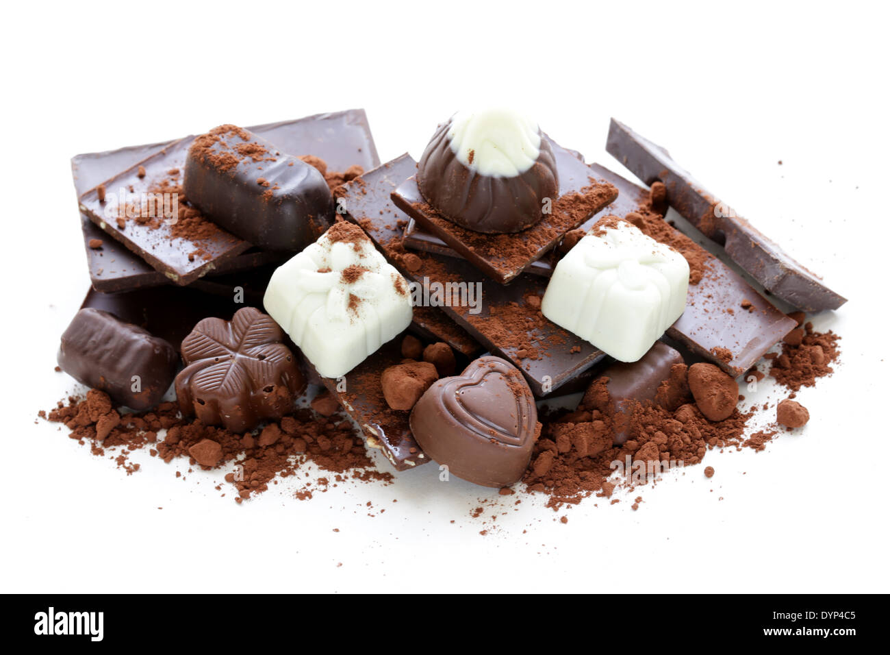 different varieties of chocolate and sweets on a white background Stock ...