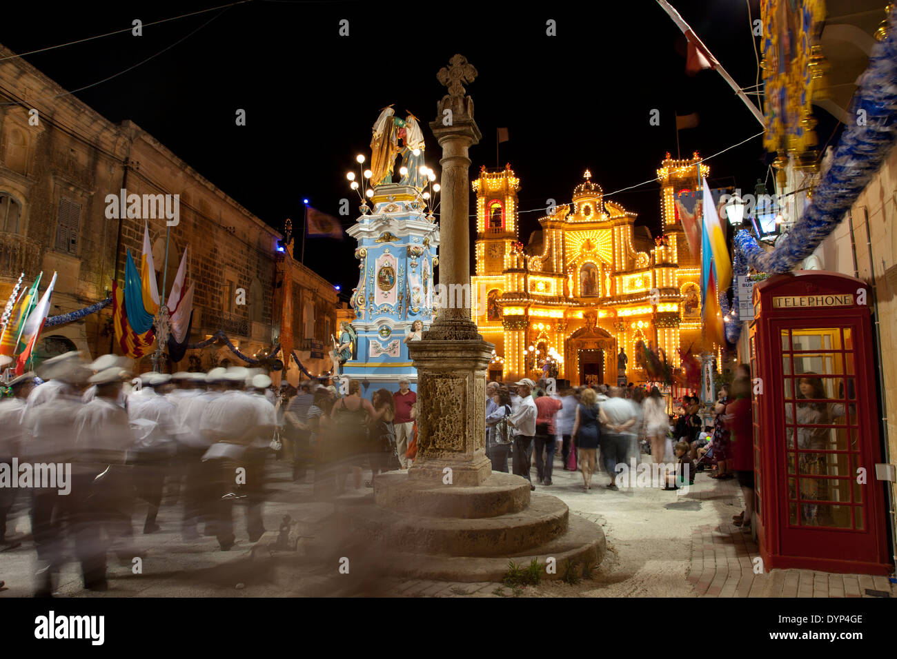 Locals fill up the town square to listen to the brass band during the ...