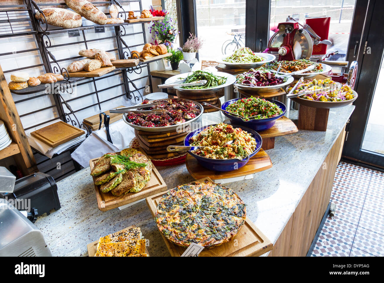 Beautiful display of vegetarian salads in a Mediterranean food ...