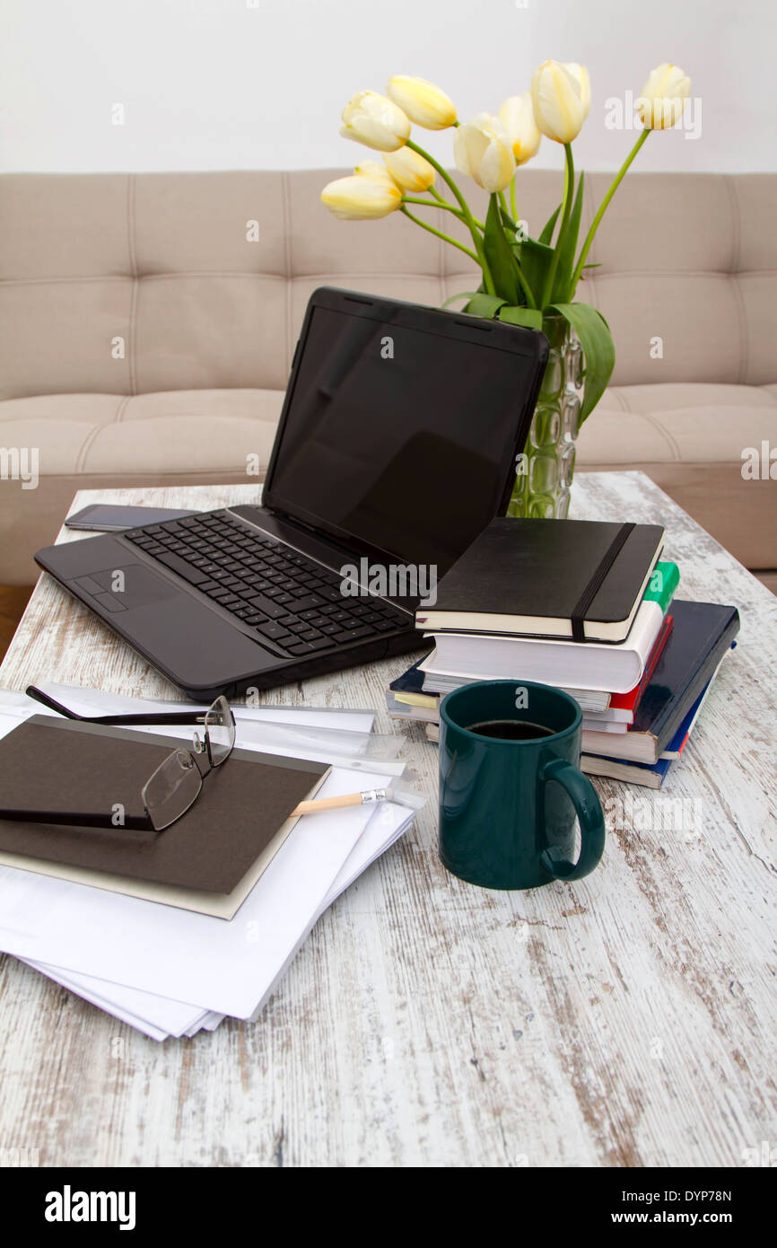 Working at home with a laptop Stock Photo - Alamy