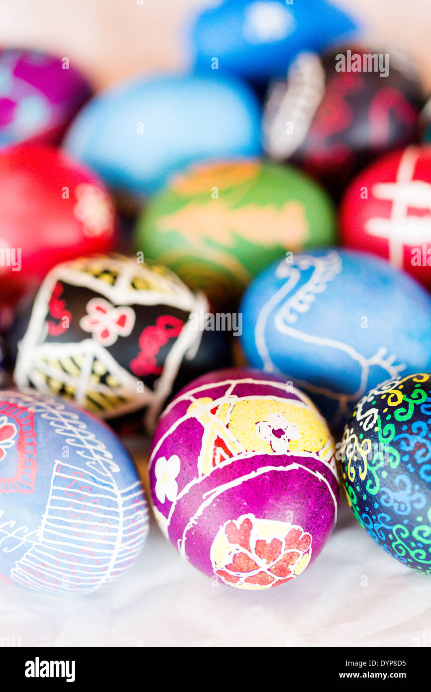 Hand painted Ukrainian Easter eggs decorated with folk designs using a ...
