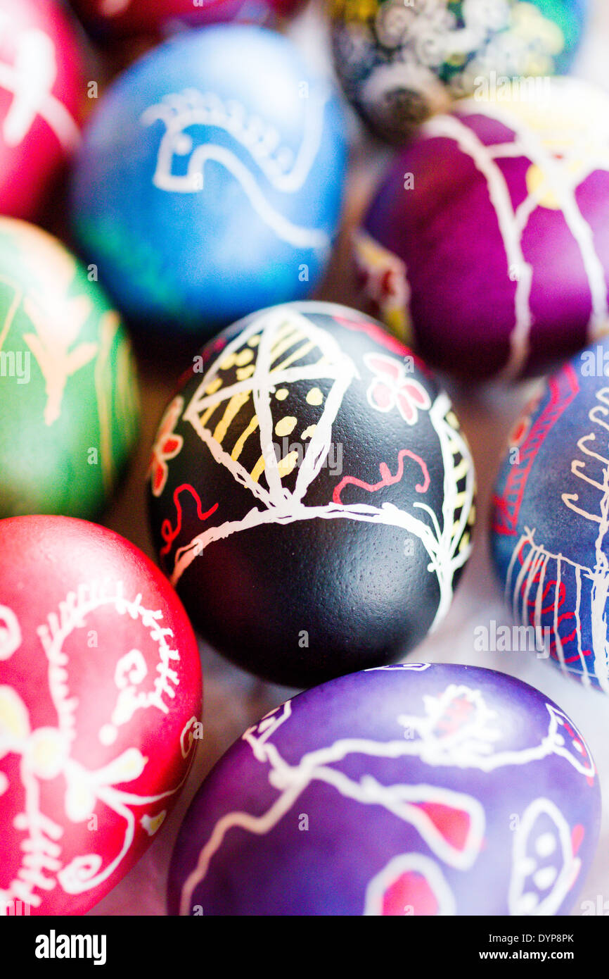 Hand painted Ukrainian Easter eggs decorated with folk designs using a ...