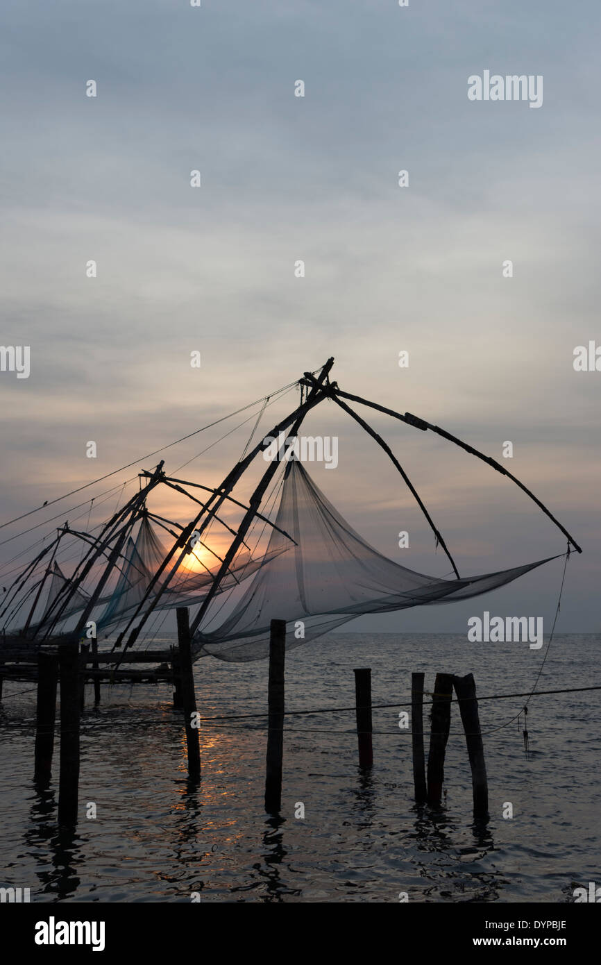 Chinese fishing nets sunset fort cochin hi-res stock photography and ...