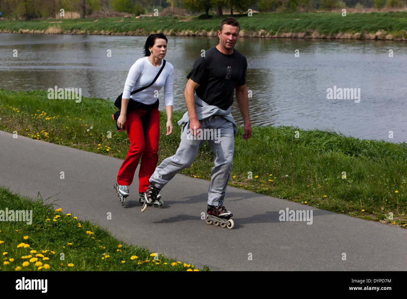 Active people use leisure time on roller skating cycle path Stock Photo ...