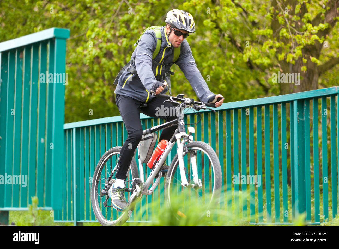 Bicycle path, leisure, regeneration, man cycling Stock Photo - Alamy