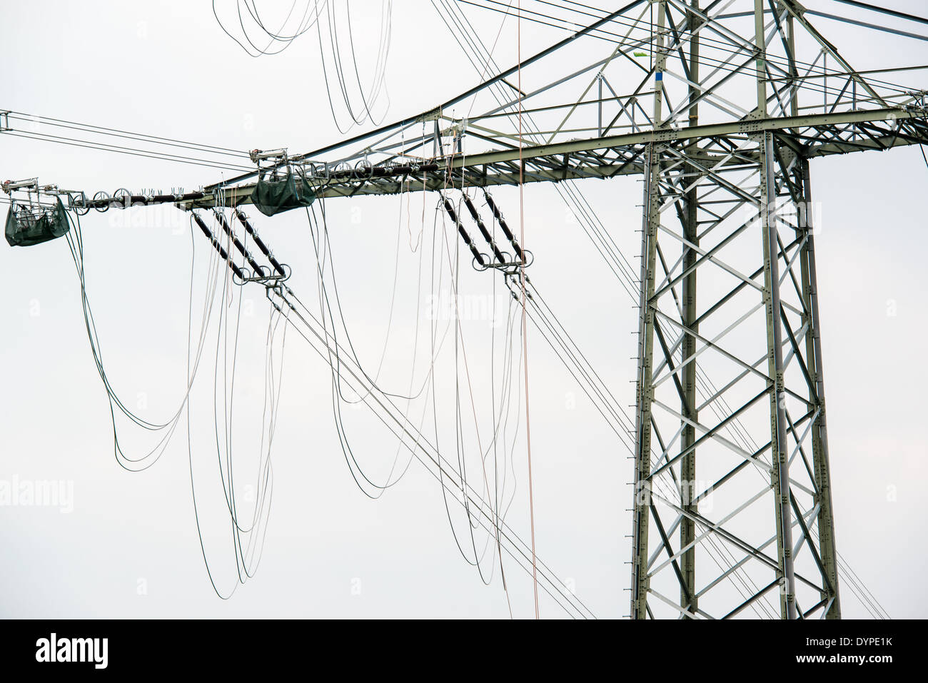 high voltage power pole construction works Stock Photo - Alamy