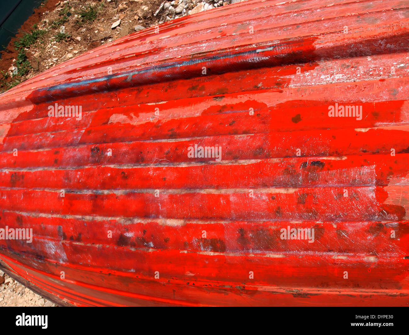 repairing old red plastic boat Stock Photo - Alamy