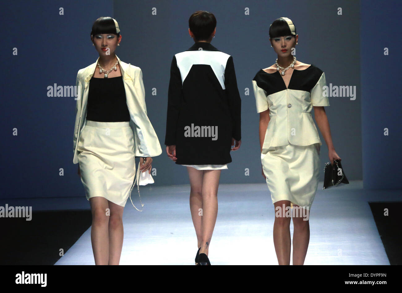 Beijing, China. 24th Apr, 2014. Models present creations designed by ...