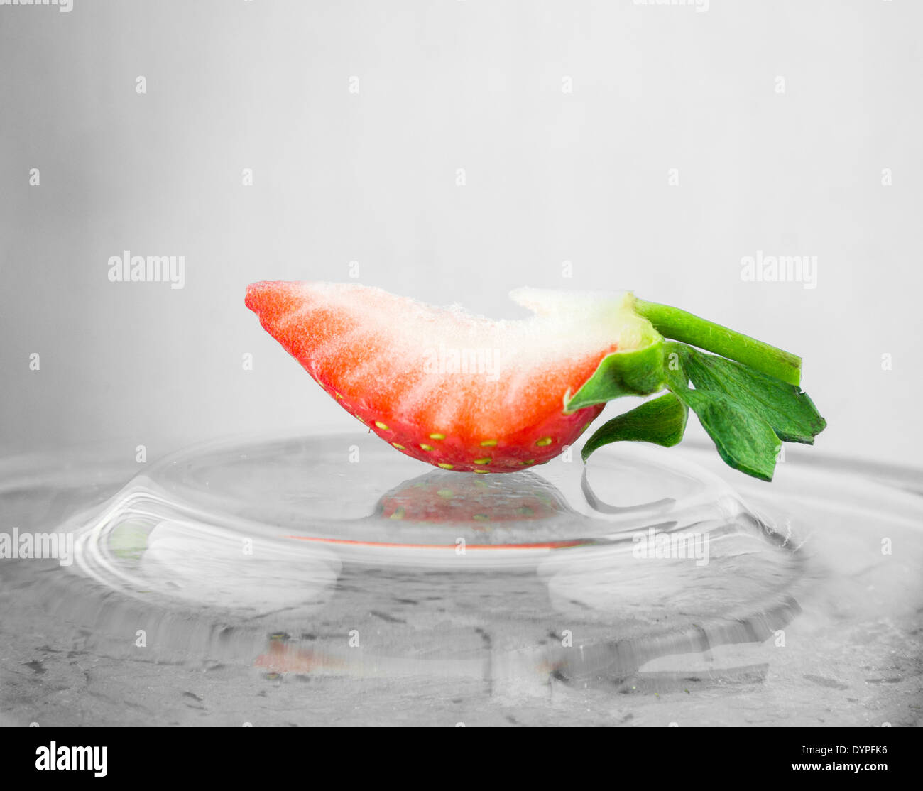 slice of strawberry on gray background , side view Stock Photo - Alamy