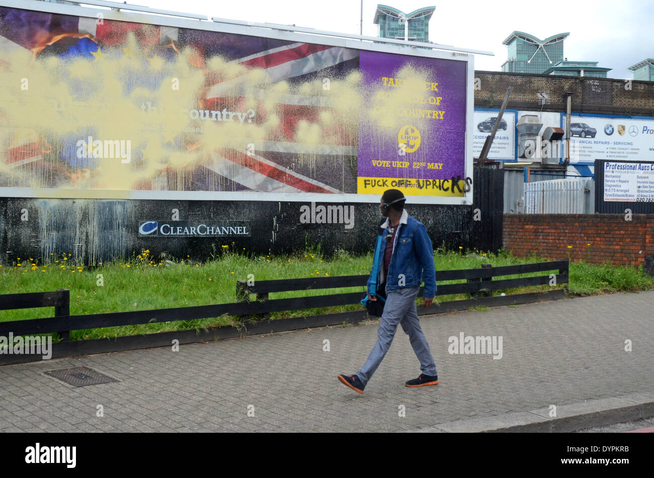 London, UK, 24 April 2014 UKIP poster defaced Credit: JOHNNY ARMSTEAD ...