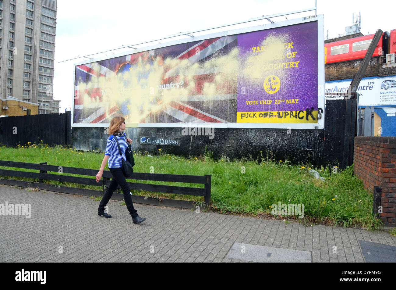 London, UK, 24 April 2014 UKIP poster defaced Credit: JOHNNY ARMSTEAD ...