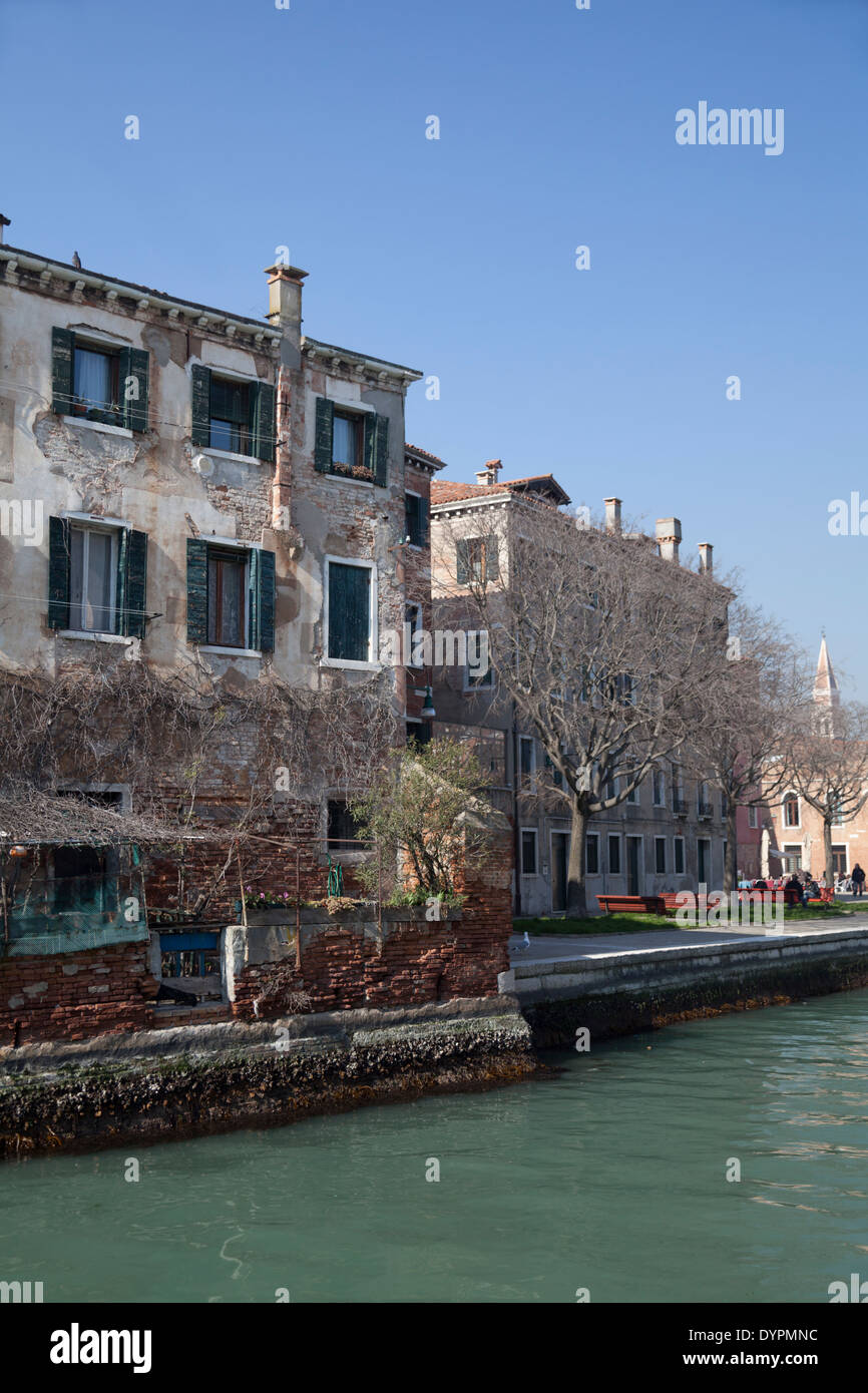 Vertical view of buildings in the Castello district from the canal ...