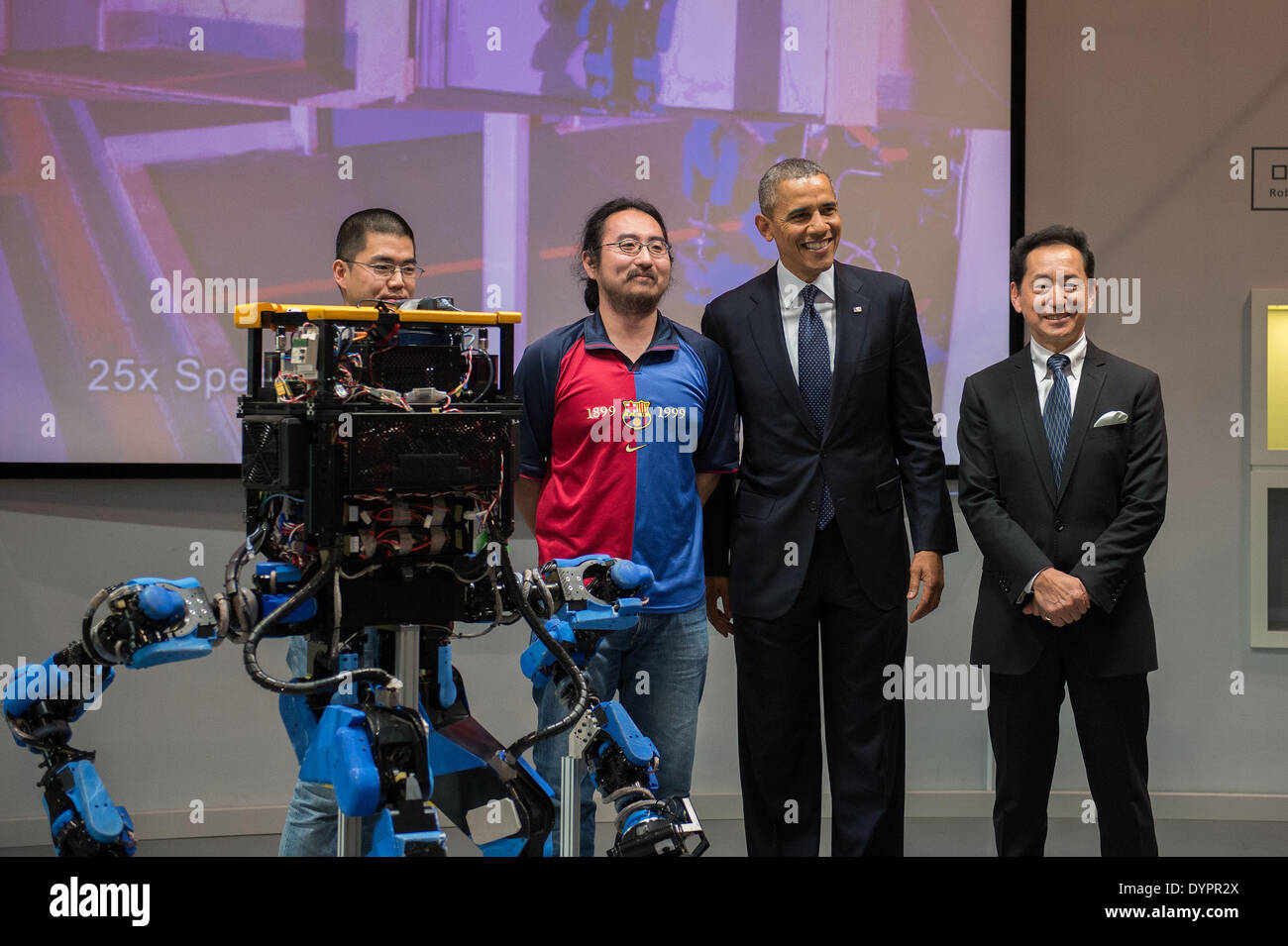 US President Barack Obama poses for a photo with Miraikan Director and ...