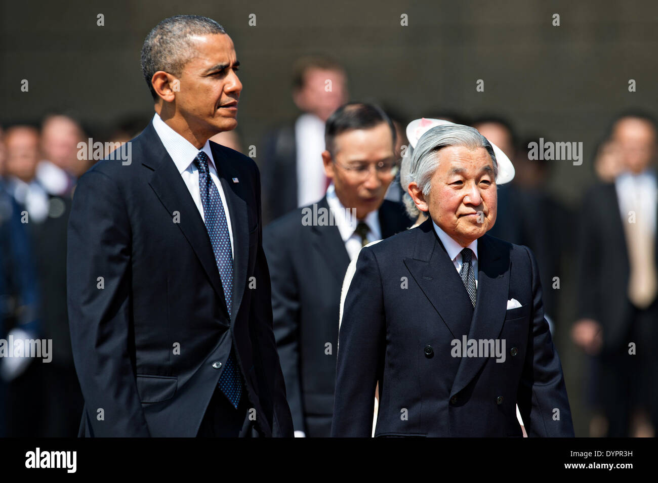 US President Barack Obama walks with Japanese Emperor Akihito during a ...