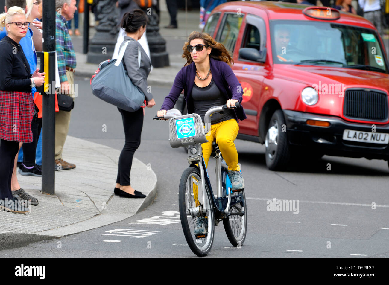 Woman riding cycle hi-res stock photography and images - Alamy