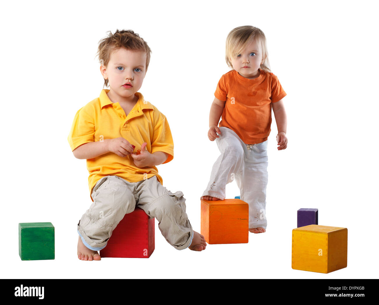 little kids plays with cubes Stock Photo - Alamy