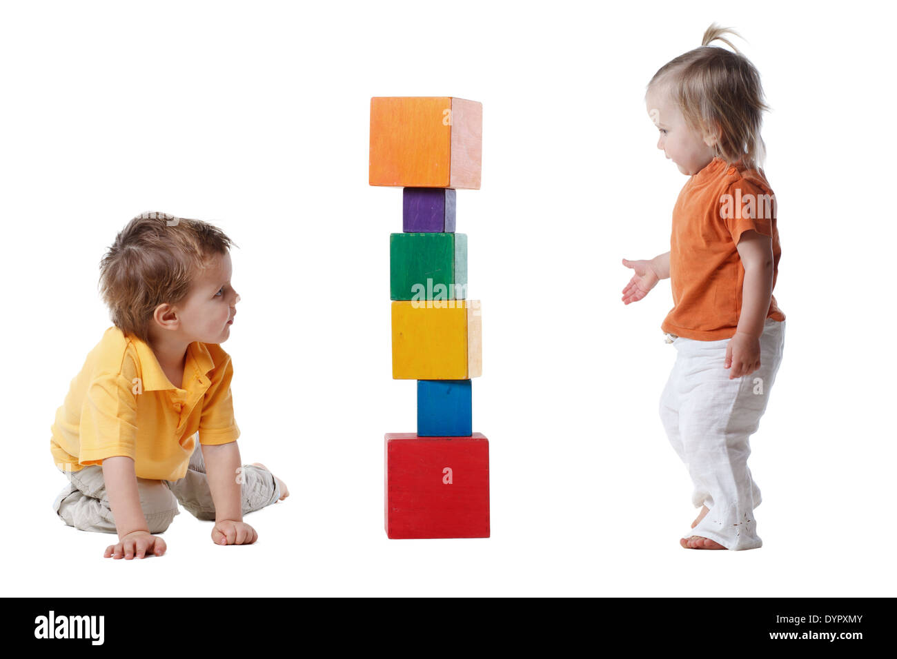 little kids plays with cubes Stock Photo - Alamy
