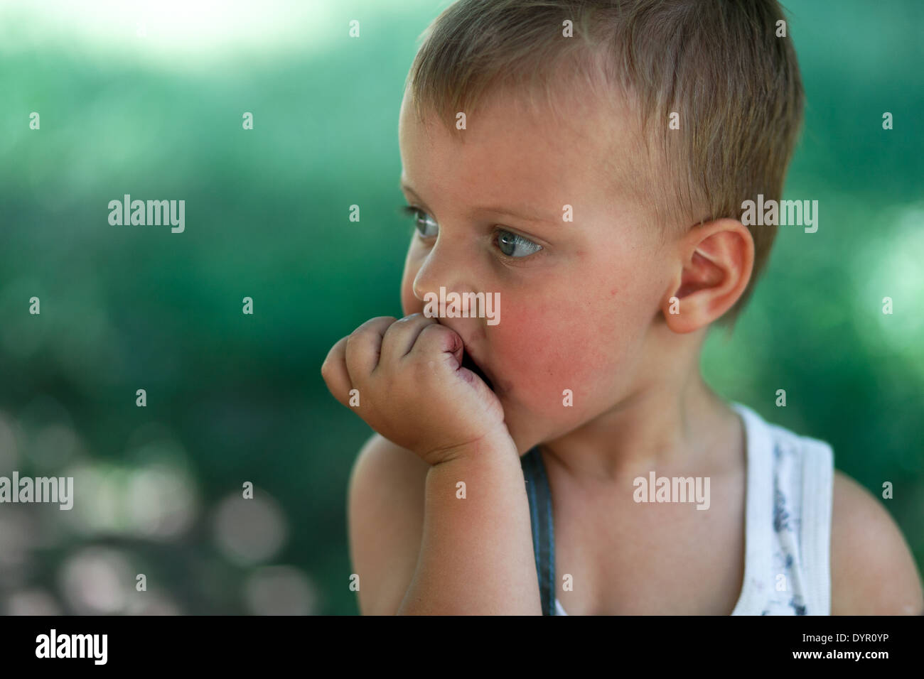 little boy eating berries Stock Photo - Alamy