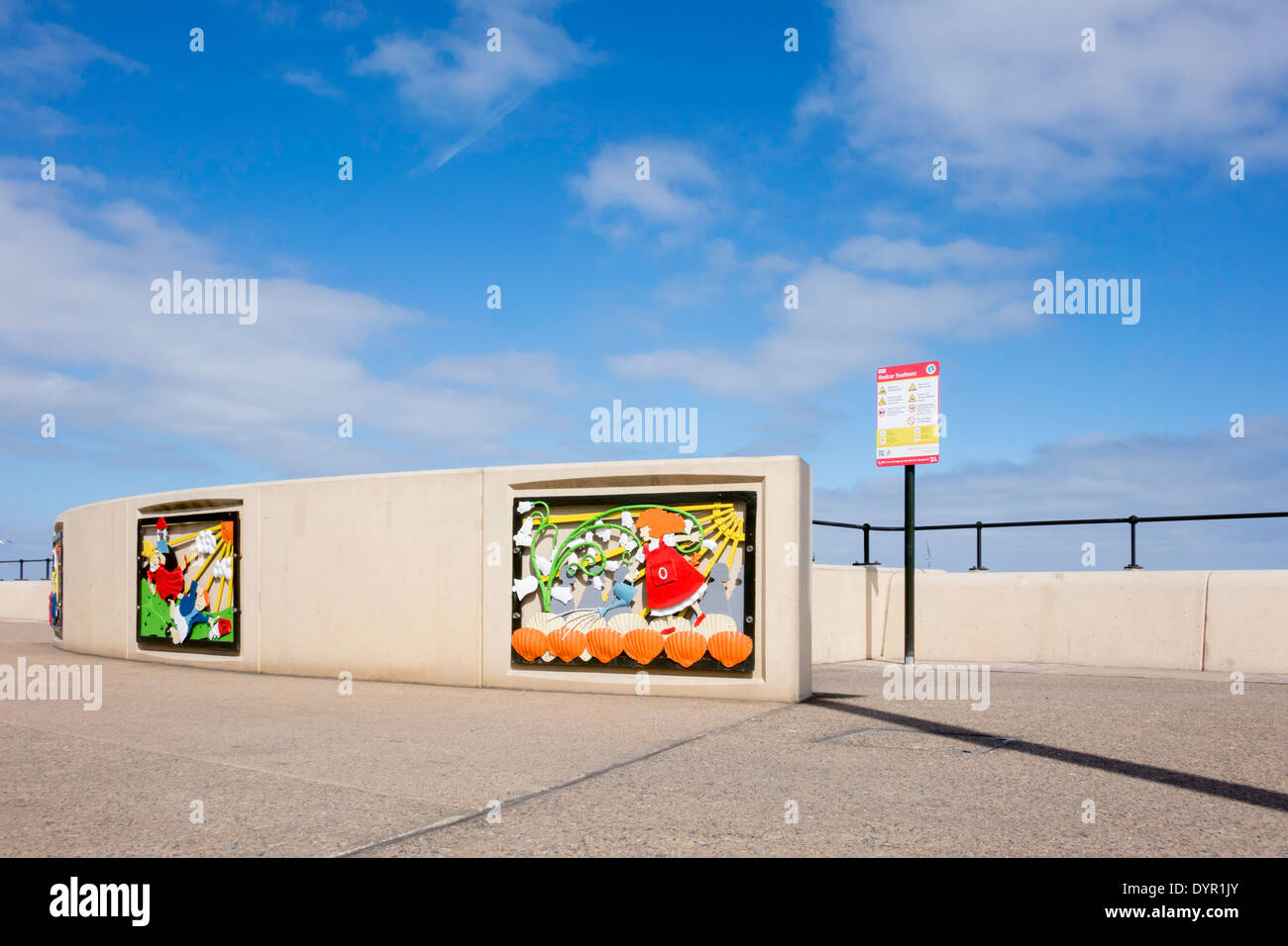 The new sea wall at Redcar with painted metal art work murals and ...