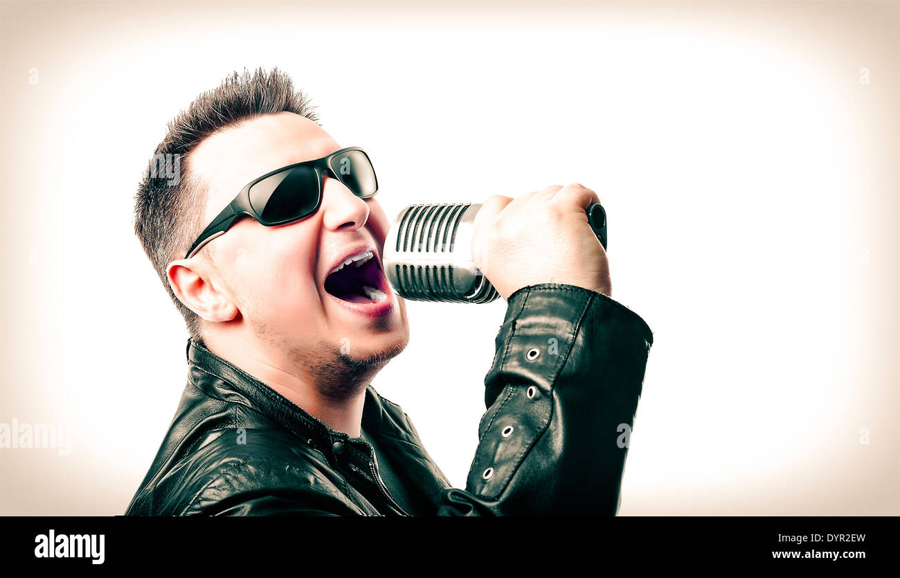 Rock singer and microphone isolated on white Stock Photo - Alamy