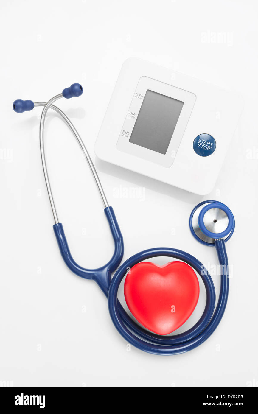 Blood pressure measuring tools with red heart - studio shoot on white ...