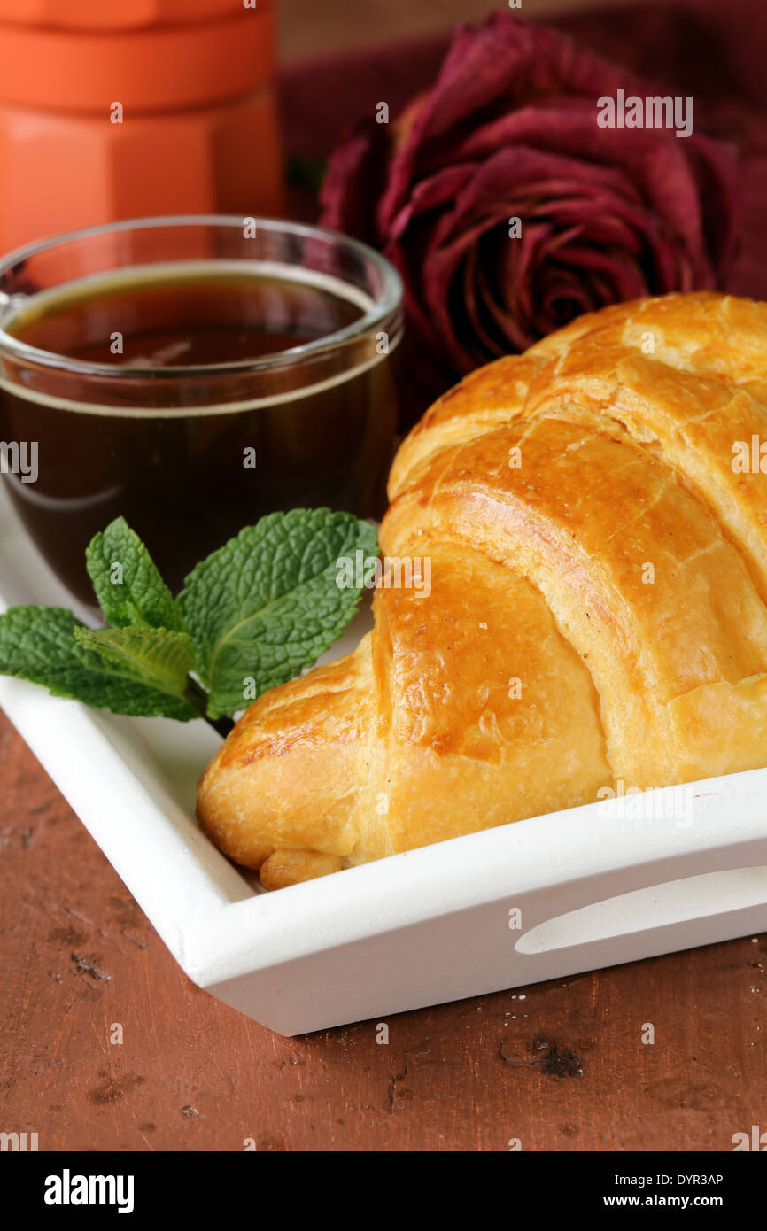 elegant coffee break or breakfast cup of coffee and croissant Stock ...