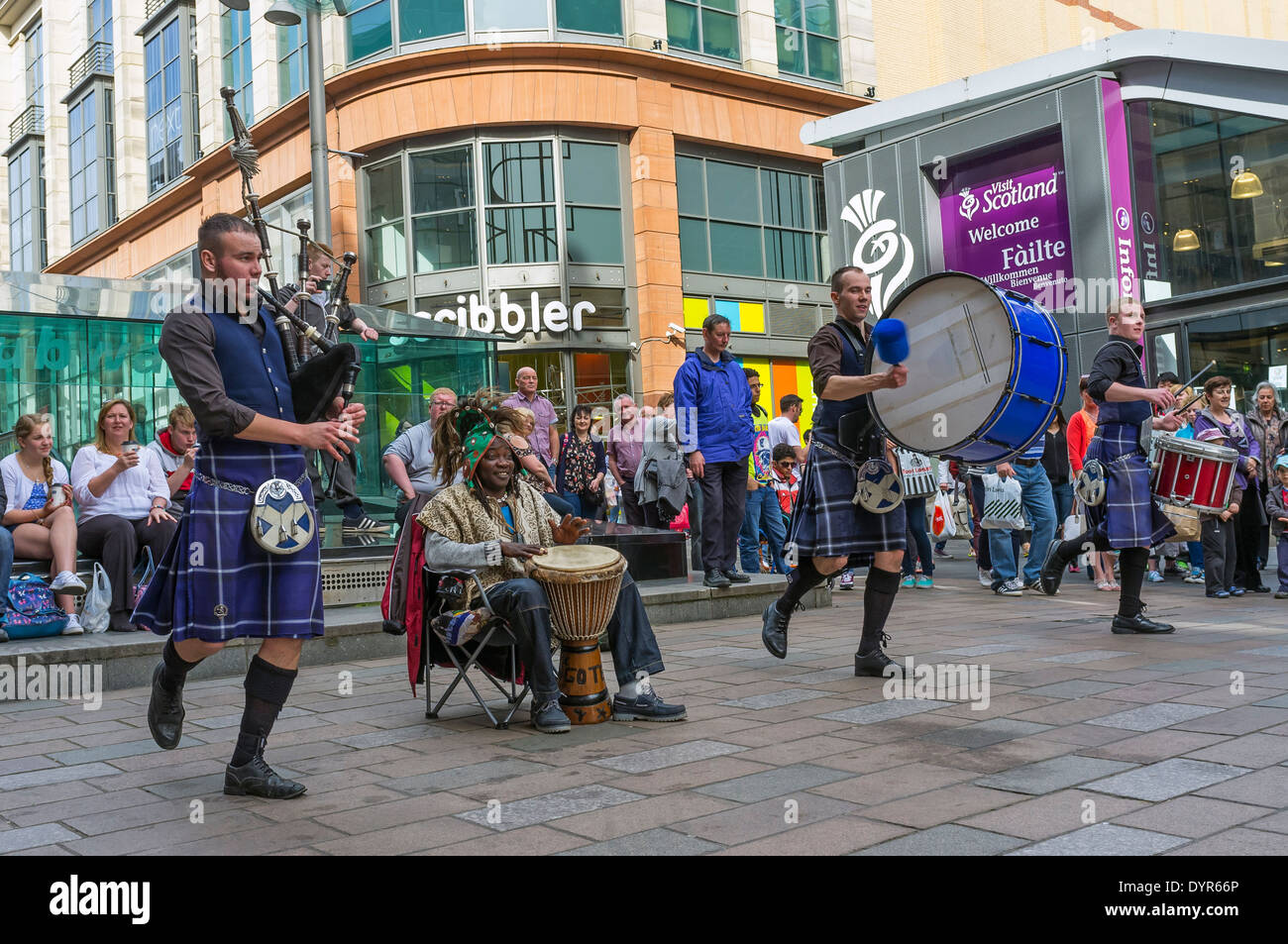 Four people busking in Buchanan Street Glasgow, Scotland, UK Stock ...