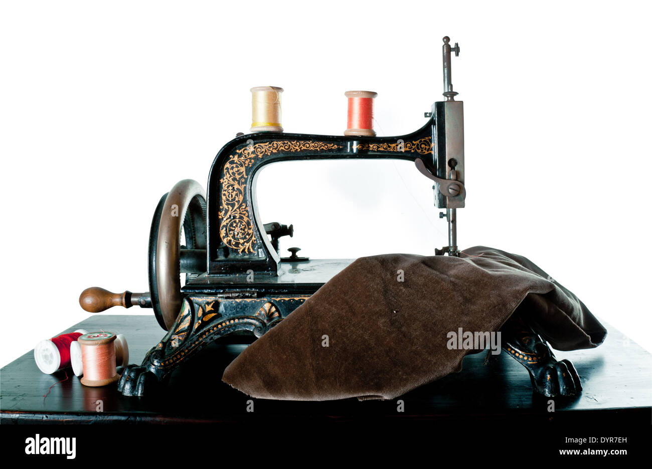 Very old sewing machine isolated against white background Stock Photo ...