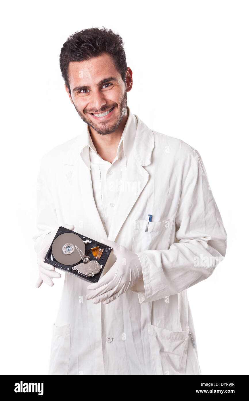 a technician wearing lab coat holding a hard disk drive Stock Photo - Alamy