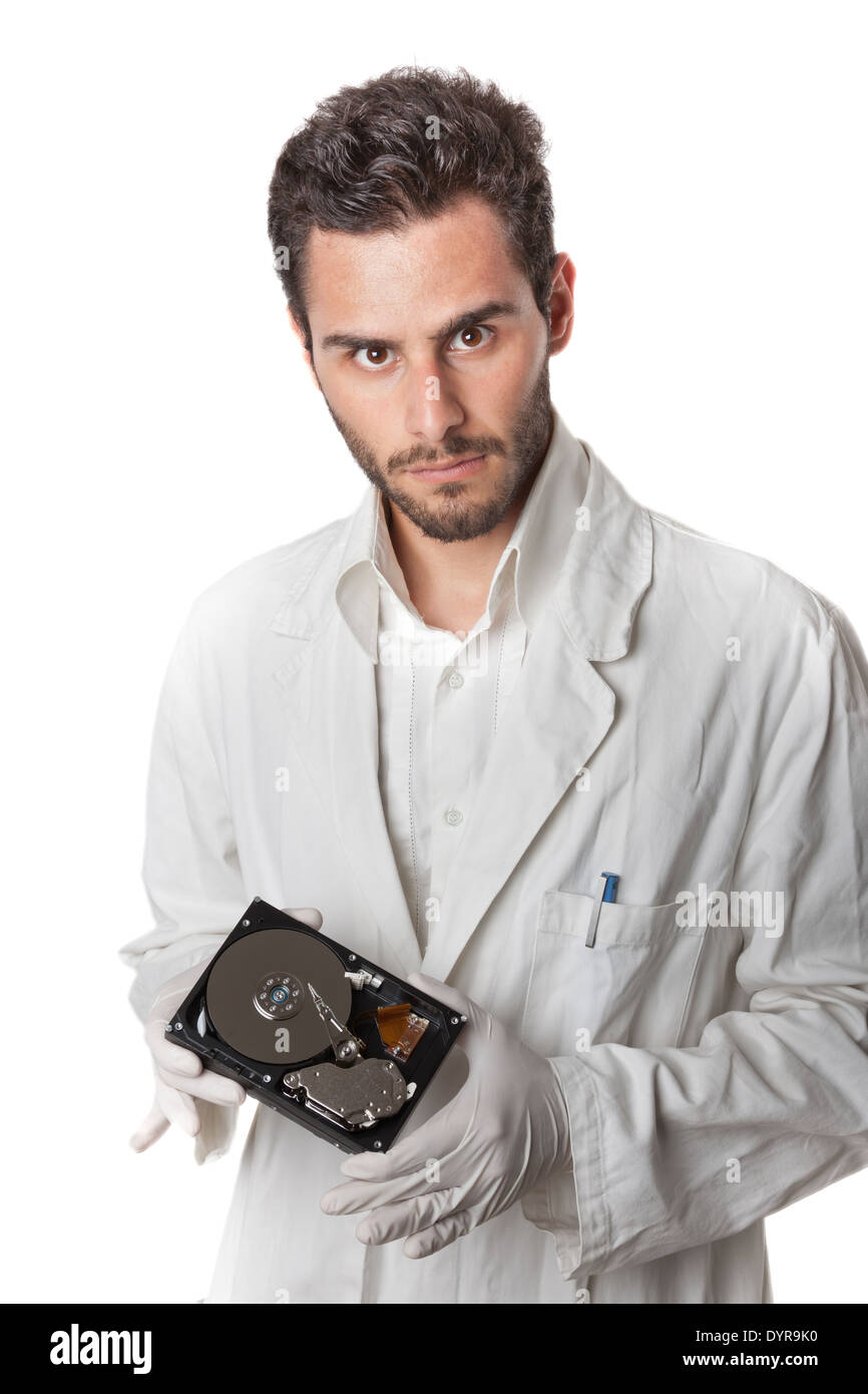 a technician wearing lab coat holding a hard disk drive Stock Photo - Alamy